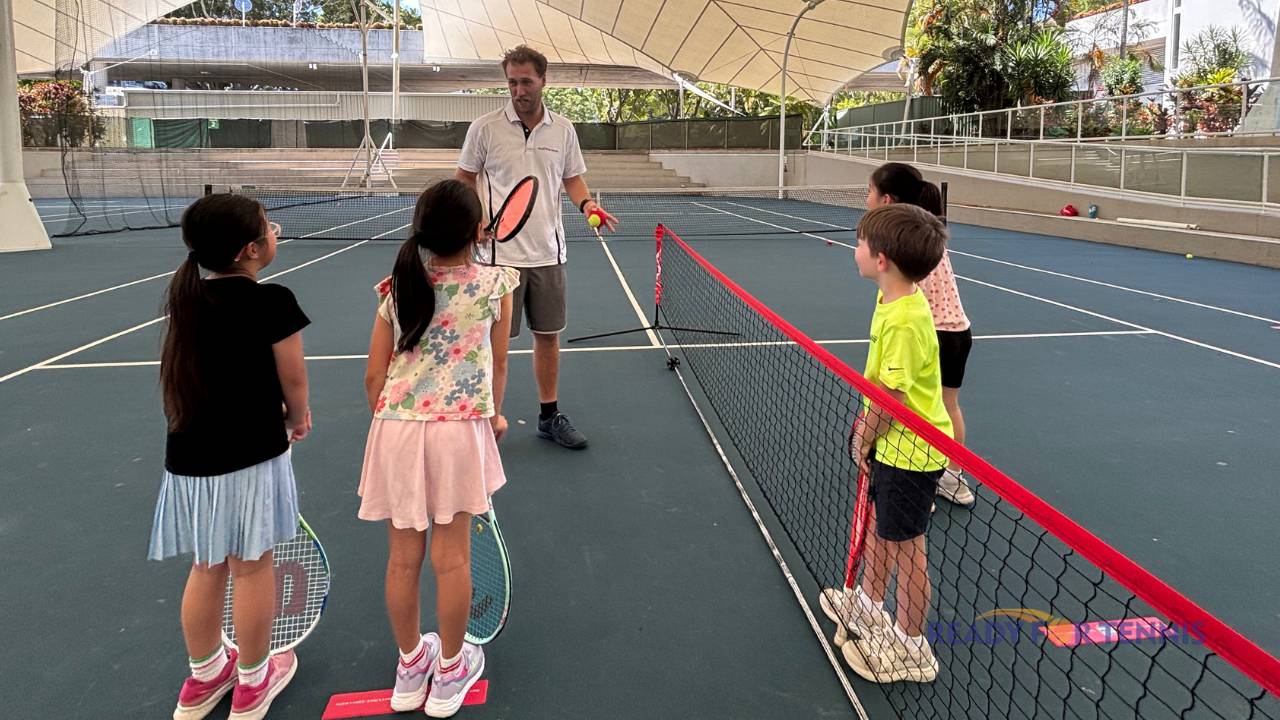 Private vs Group Tennis Lessons for Kids | What Parents Should Know