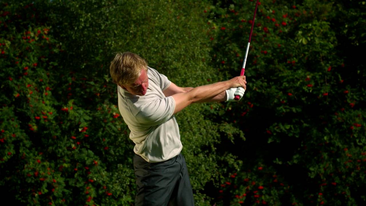 Slow motion golf swing and in-depth article on learning the golf swing