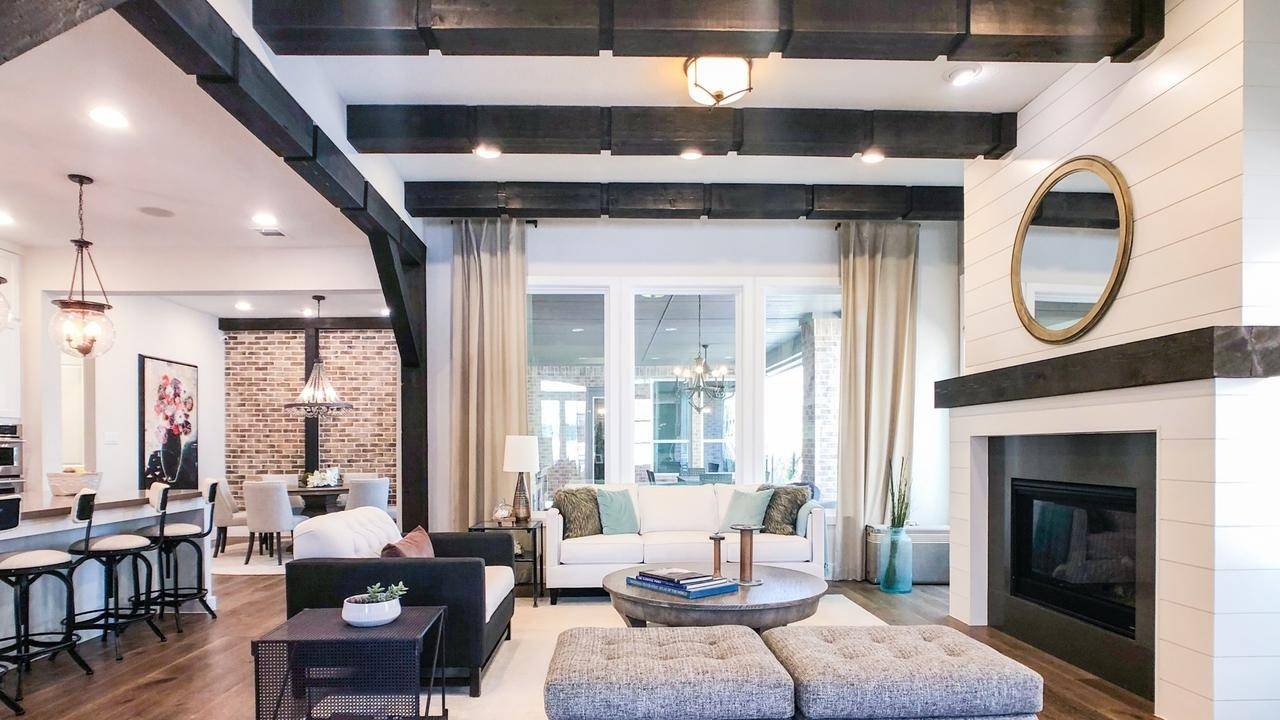 Add wood beams to your home for a bold design with neutral colors