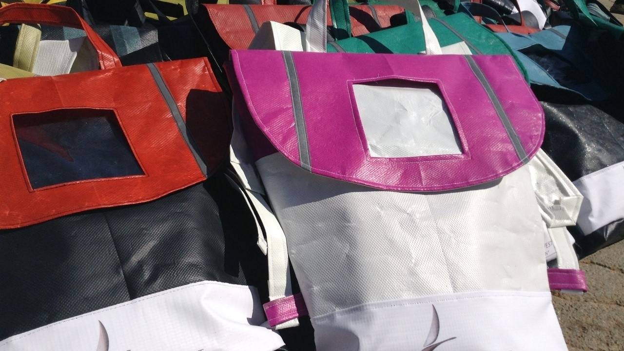 Plastic is reused to create solar backpacks for African children.